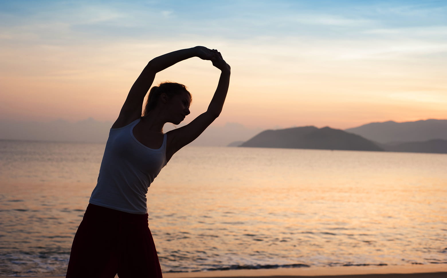 Beach Yoga: 4 Exercises You'll Love!